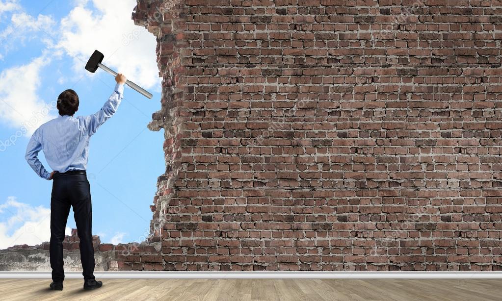 Destroying barriers Stock Photo by ©SergeyNivens 51217611