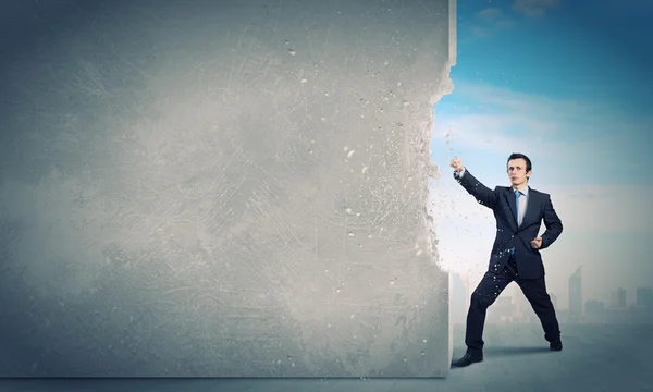 Man breaking wall Stock Photos, Royalty Free Man breaking wall Images ...