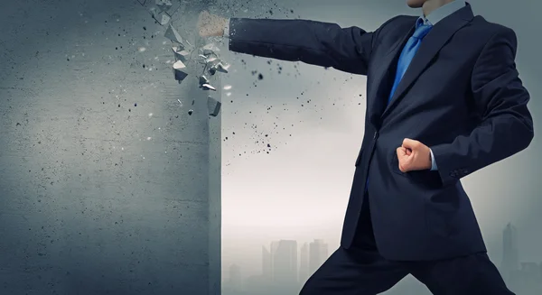 Man breaking wall Stock Photos, Royalty Free Man breaking wall Images ...