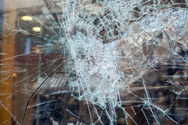 Closeup of smashed glass panel cracked and broken Stock Photo by ...