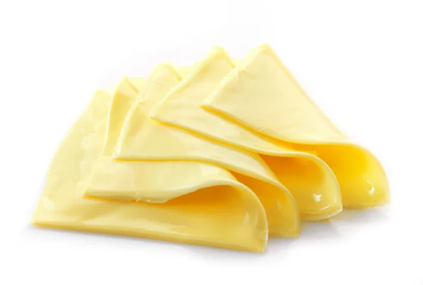 Creamy processed cheese slices Stock Photo by ©magone 29923923