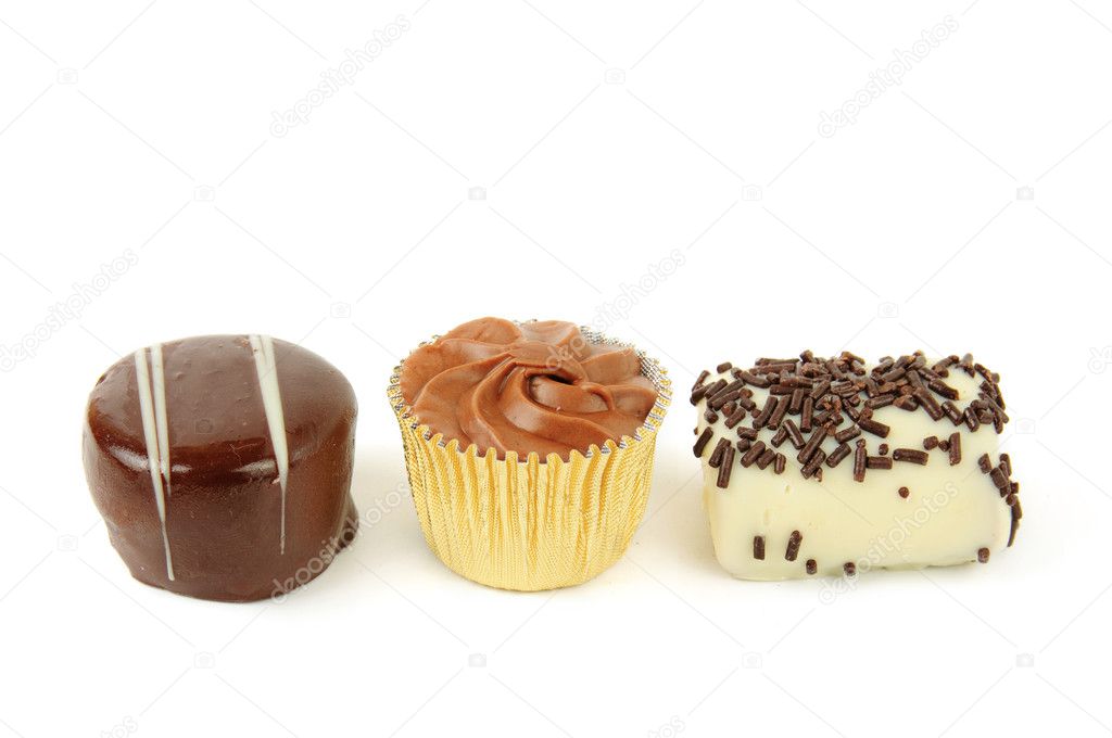 Three chocolate sweets Stock Photo by ©Roxana 12495354