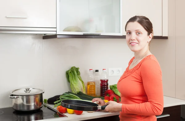 Woman sweaty kitchen Stock Photos, Royalty Free Woman sweaty kitchen ...