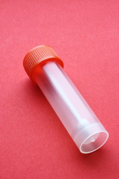 Vessel for stool collection on orange background Stock Photo by ...