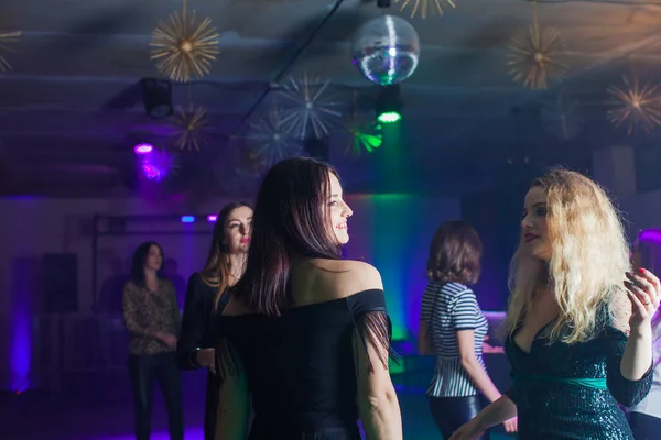 Group of dancing women enjoying night in club - Stock Image - Everypixel
