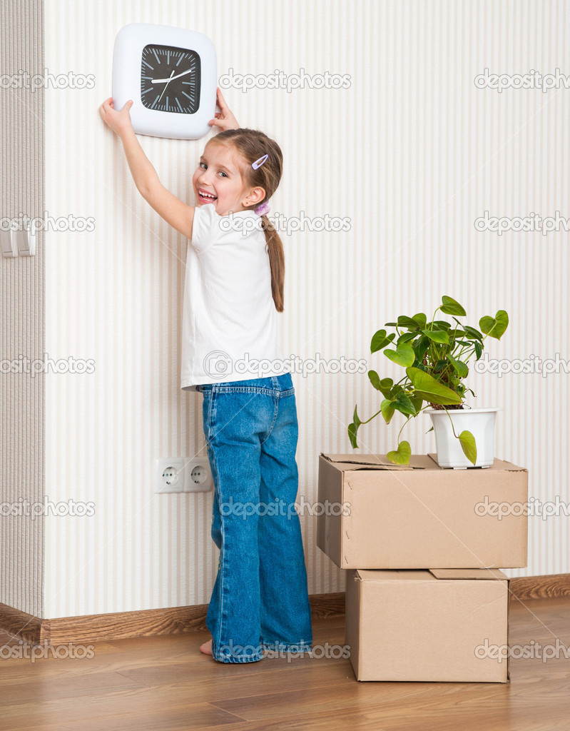 Little girl moving into new house Stock Photo by ©tan4ikk 21191497