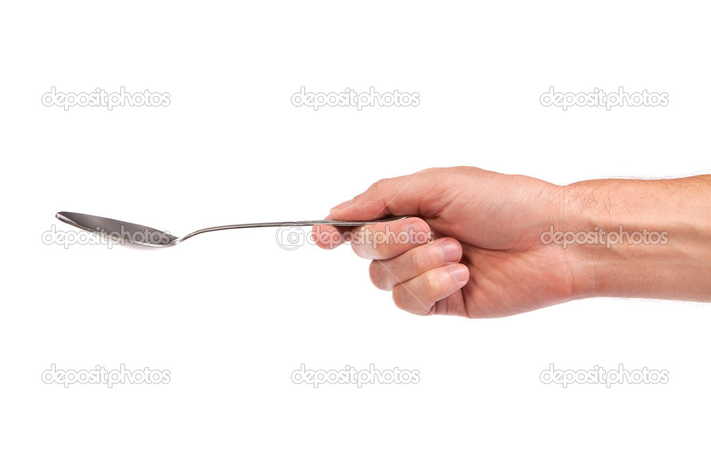 Hand is holding a spoon isolated Stock Photo by ©bloodua 13634906