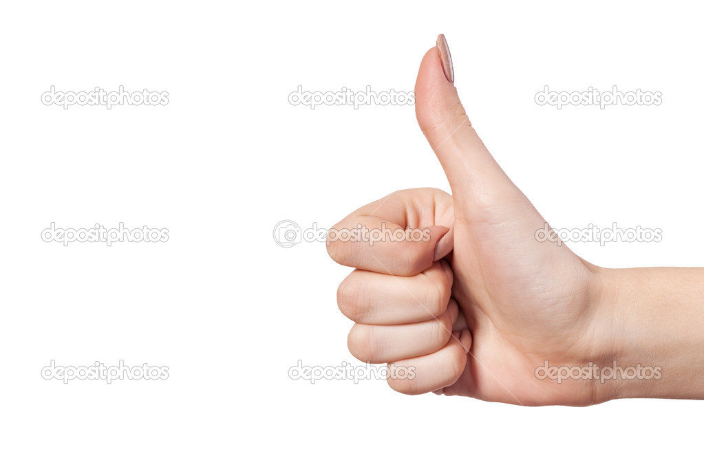 Femelle main montrant le pouce en lair signe isolé sur blanc ...
