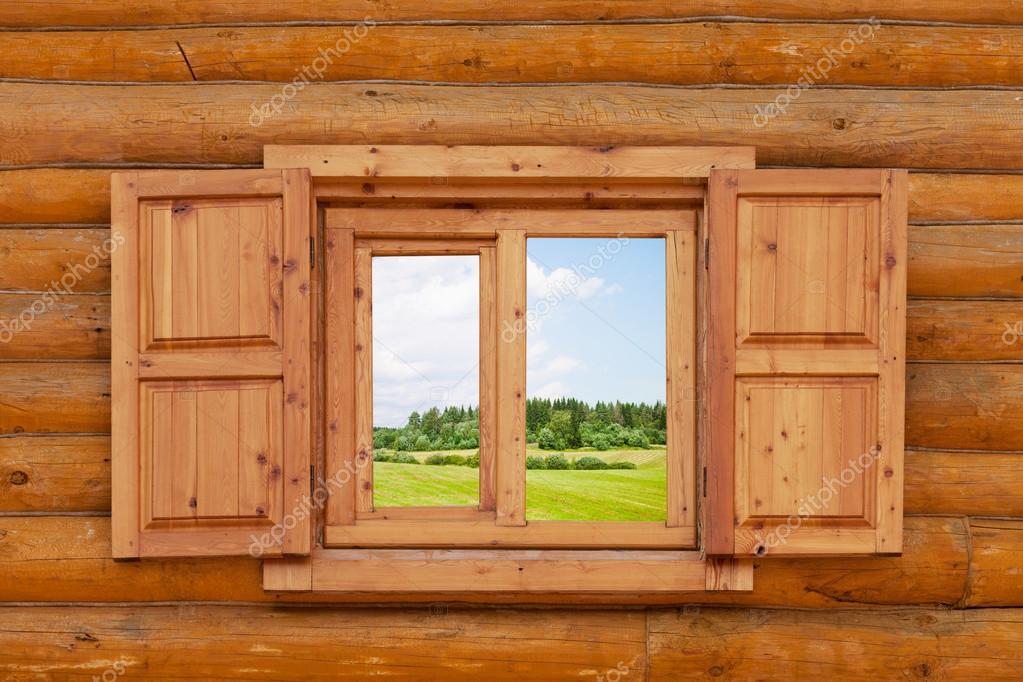 Field is visible from a window in the wooden rural house — Stock Photo ...
