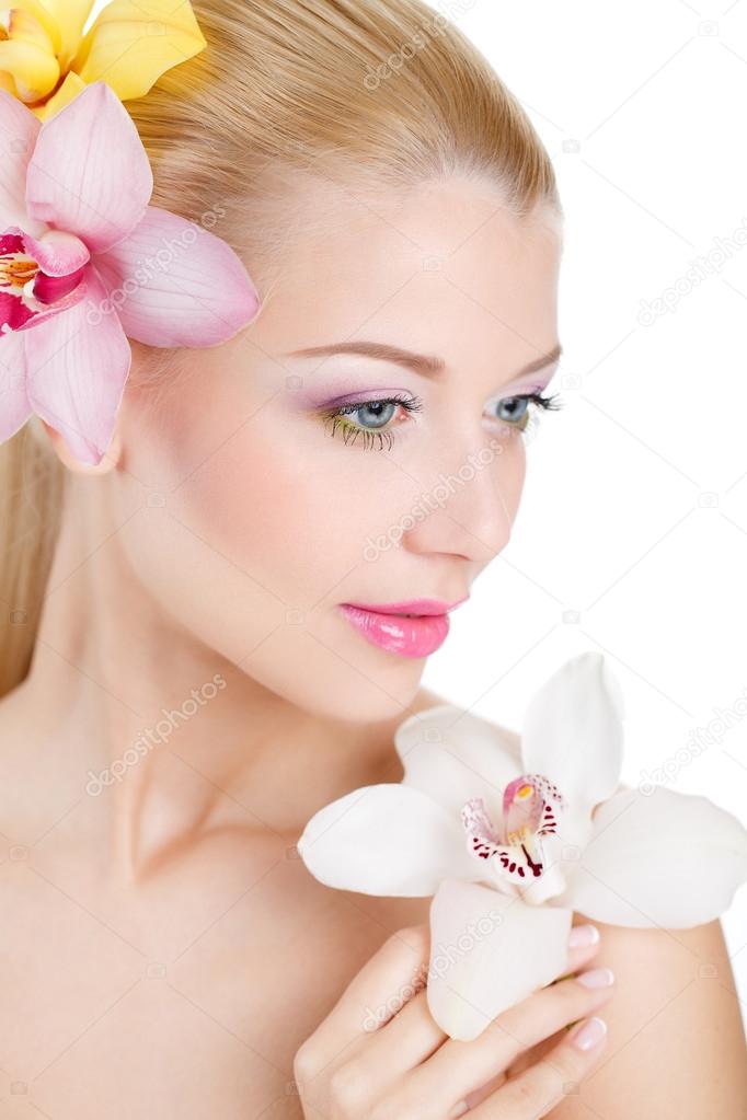 Portrait Of Beautiful Woman With Orchid Flower In Her Hair Beautiful