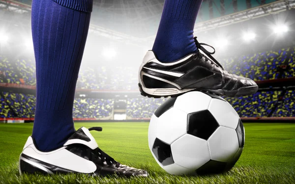 Legs of soccer player Stock Photo by ©sergeypeterman 5613237