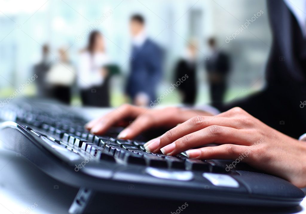 Human hands working on laptop on office background Stock Photo by ...