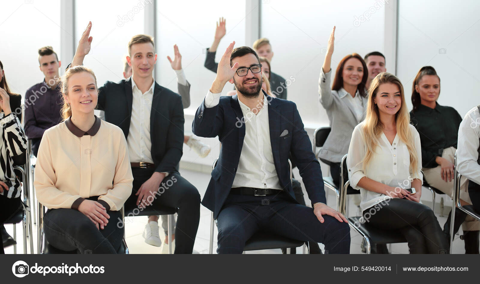 Group of employees asking questions during a business meeting — Stock ...