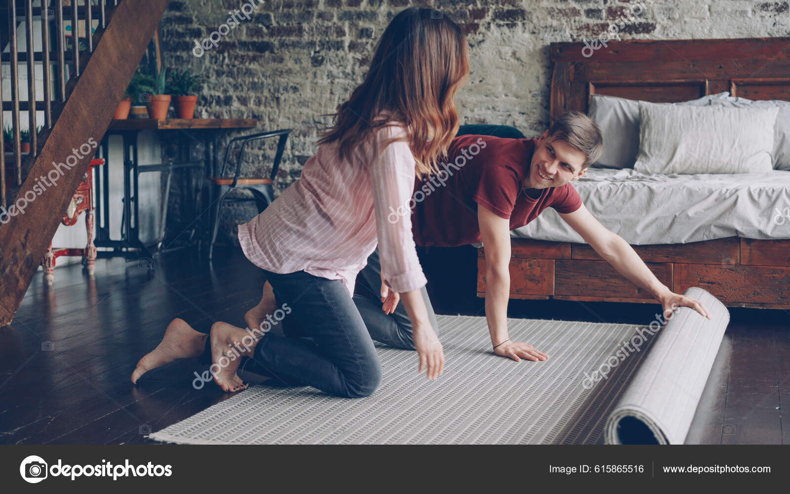 Young Married Couple Rolling Out Beautiful New Carpet Ion Floor — Stock Photo © silverkblack ...