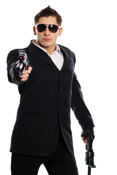 Men in black suit holding gun Stock Photo by ©arkusha 37362863