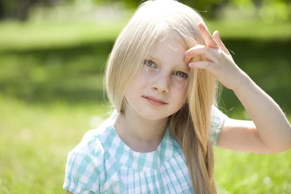 Portrait of a beautiful young blonde little girl — Stock Photo © arkusha #119716122