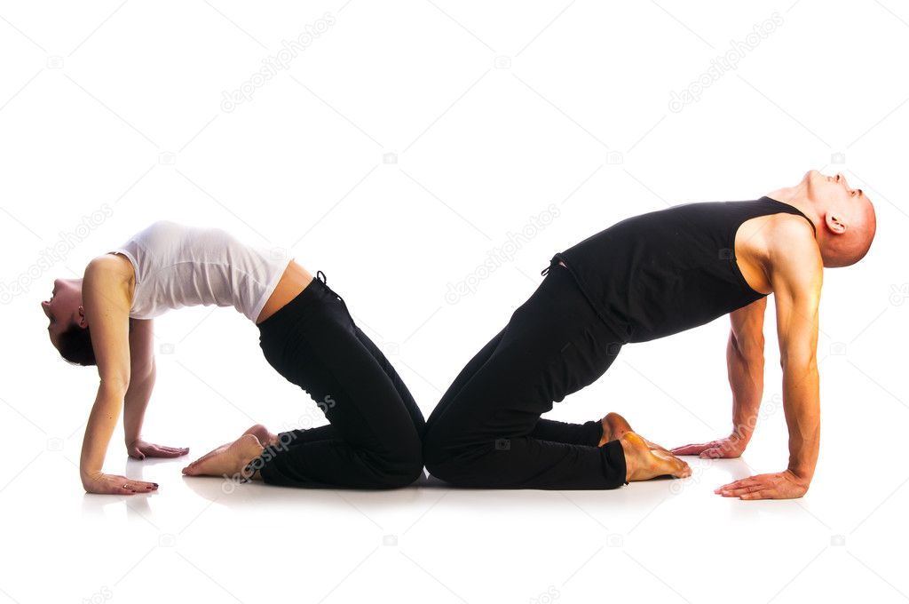 Couple in Ushtrasana yoga pose Stock Photo by ©nanka-photo 31347861