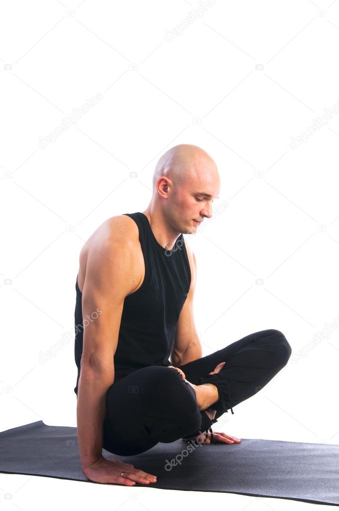 Man in Tolasana Pose Stock Photo by ©nanka-photo 31348211