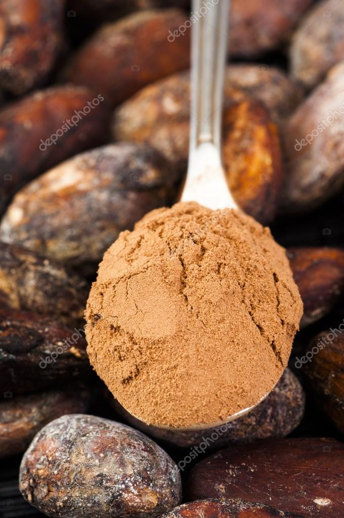 Tea spoon with cocoa powder — Free Stock Photo © nanka-photo #39441801