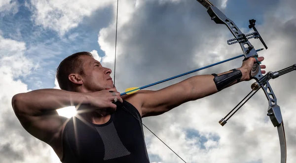 Man with bow and arrows — Stock Photo © rihardzz #34661531