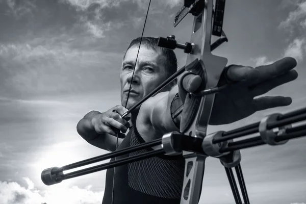 Man with bow and arrows — Stock Photo © rihardzz #34661531