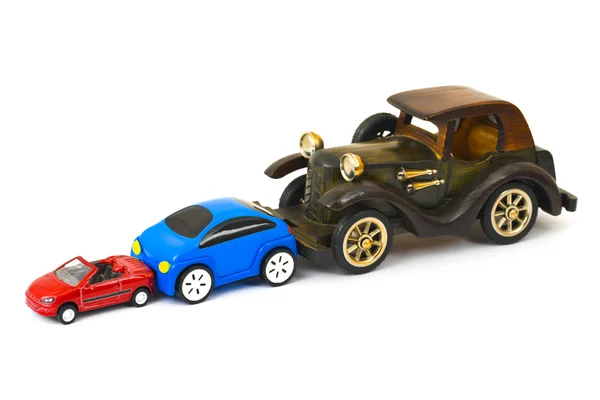Three wooden toy cars in a row Stock Photo by ©Gjermund 3548220