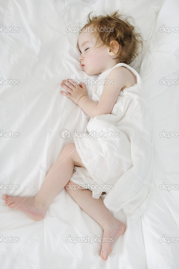 Adorable toddler girl sleeping Stock Photo by ©MNStudio 13724820