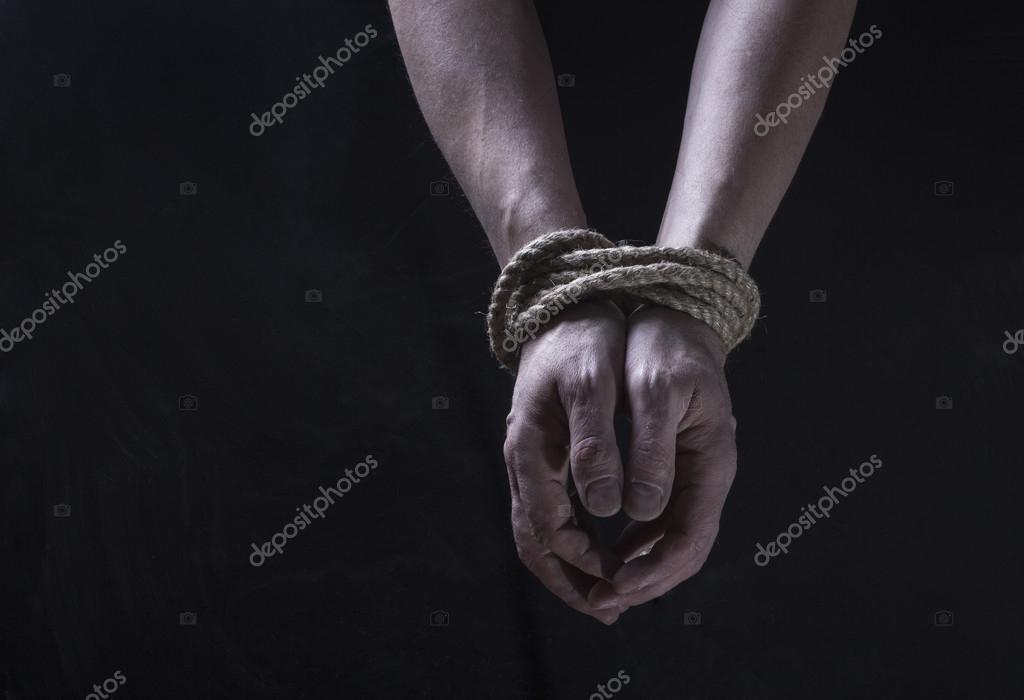 Hands of a missing kidnapped Stock Photo by ©papa42 38559729