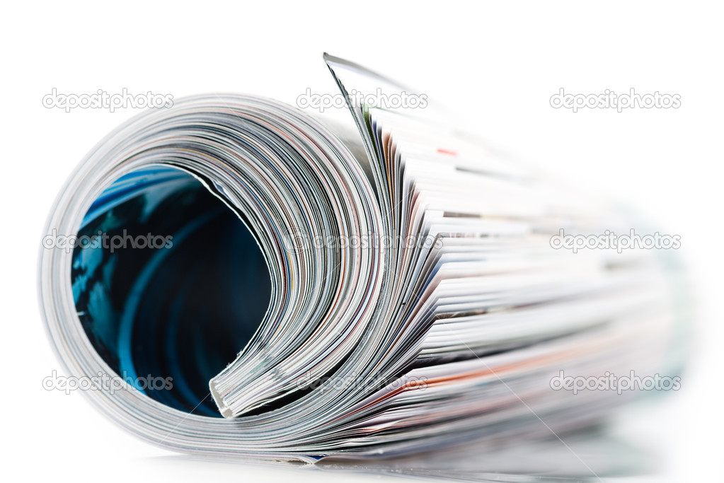 Magazine roll on white background Stock Photo by ©valphoto 20193111