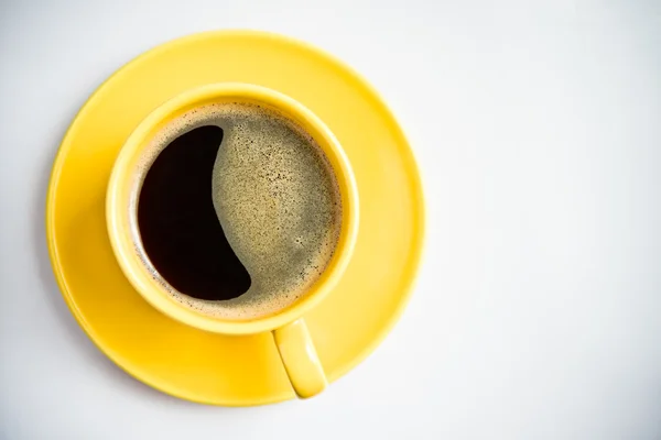 Coffee in an yellow cup and a muffin Stock Photo by ©valphoto 21574231