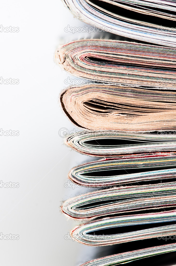 A large stack of magazines piled high. Stock Photo by ©valphoto 22851538