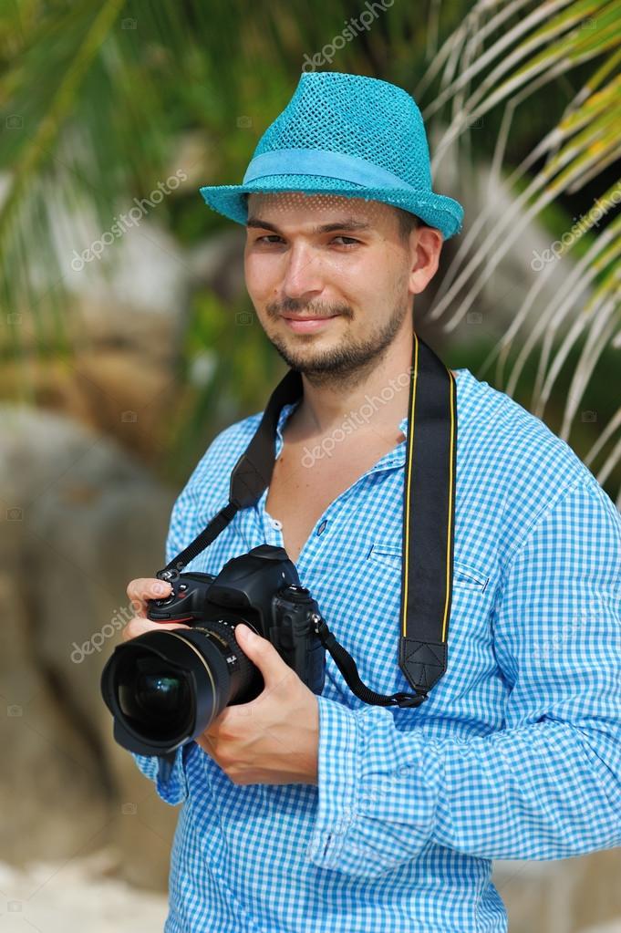 Man with camera — Stock Photo © haveseen #14729153