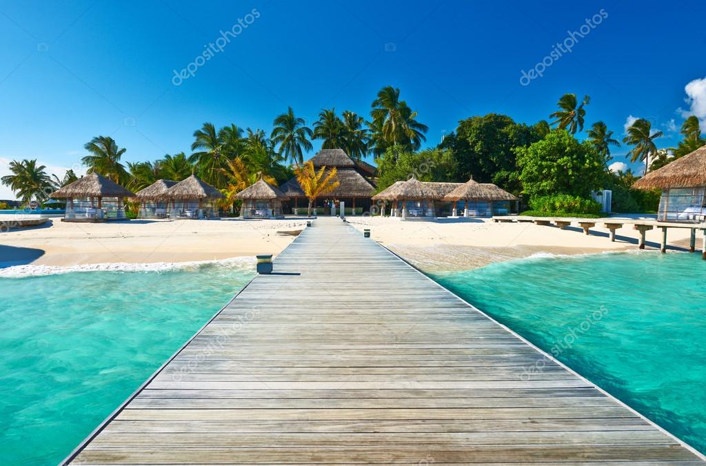 Beautiful beach with jetty Stock Photo by ©haveseen 22493957