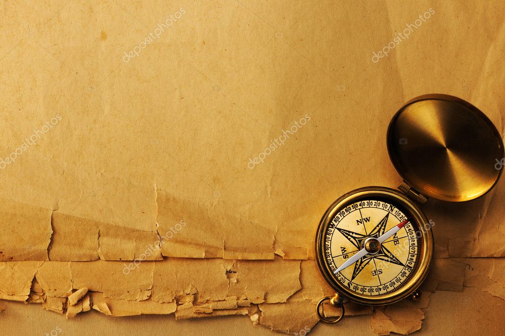 Antique brass compass over old background Stock Photo by ©haveseen 24150613