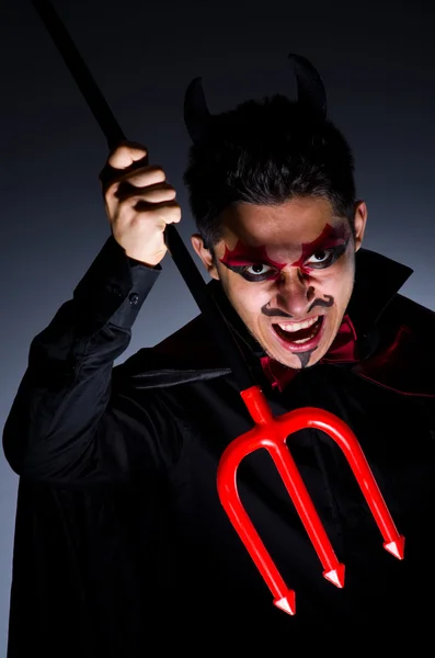 Man in devil costume in halloween concept Stock Photo by ©Elnur_ 32101961