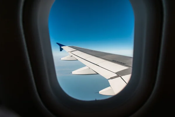 Airplane wing window Stock Photos, Royalty Free Airplane wing window ...