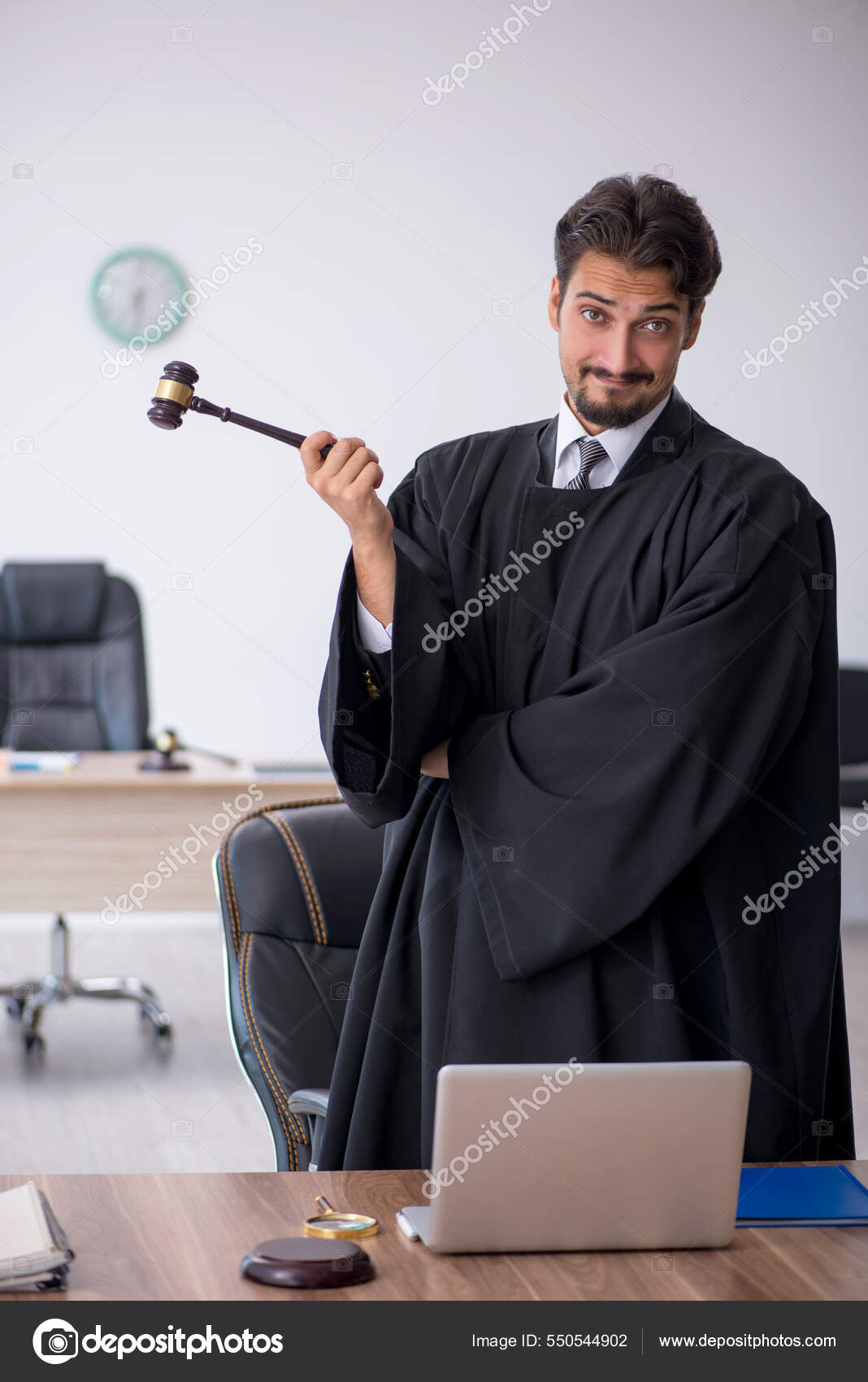 Young male judge working in the courthouse — Stock Photo © Elnur ...