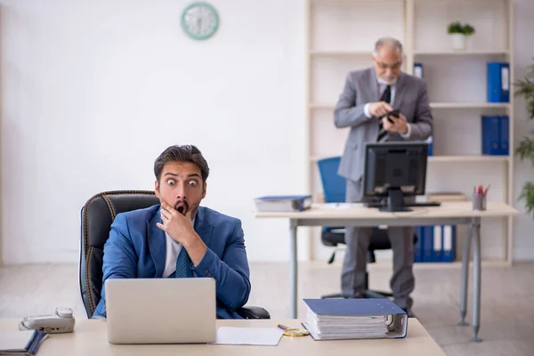 Boss watching employees Stock Photos, Royalty Free Boss watching ...