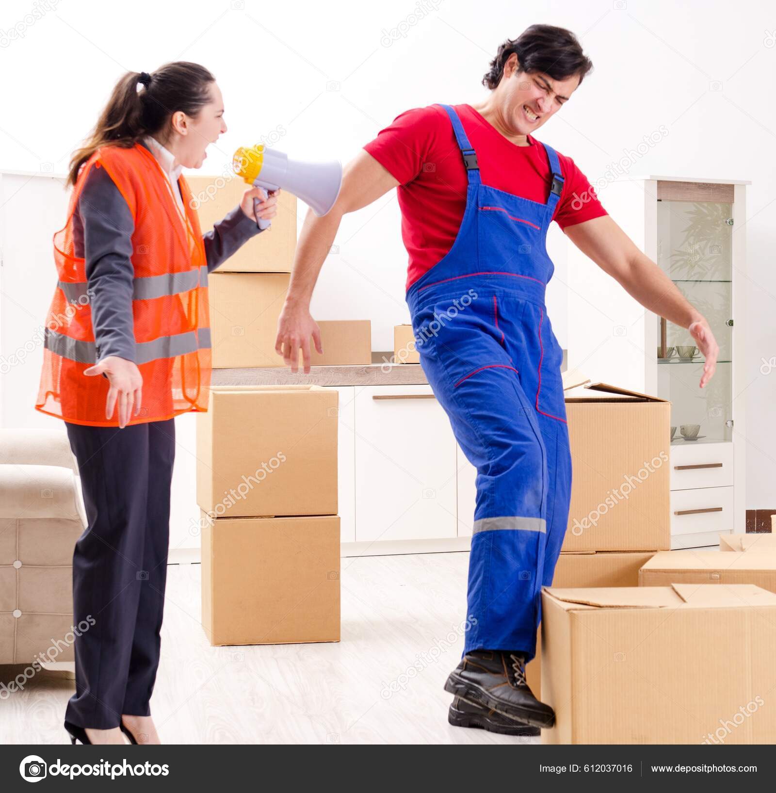 Professional Movers Doing Home Relocation — Stock Photo © Elnur_ #612037016