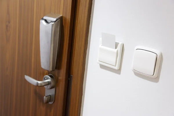 Key card slot and switch on hotel room wall — Stock Photo © rilueda ...