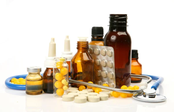 Tablets for treatment of illness Stock Photo by ©Elena777 21270845