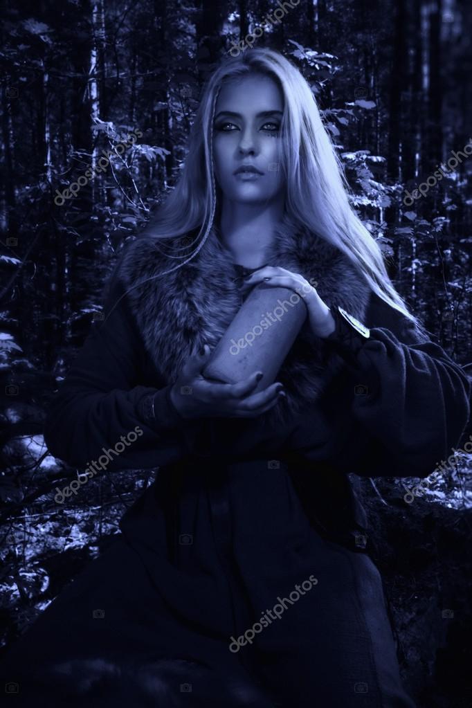 Scandinavian witch pythoness with runes Stock Photo by ©Demian 12693806