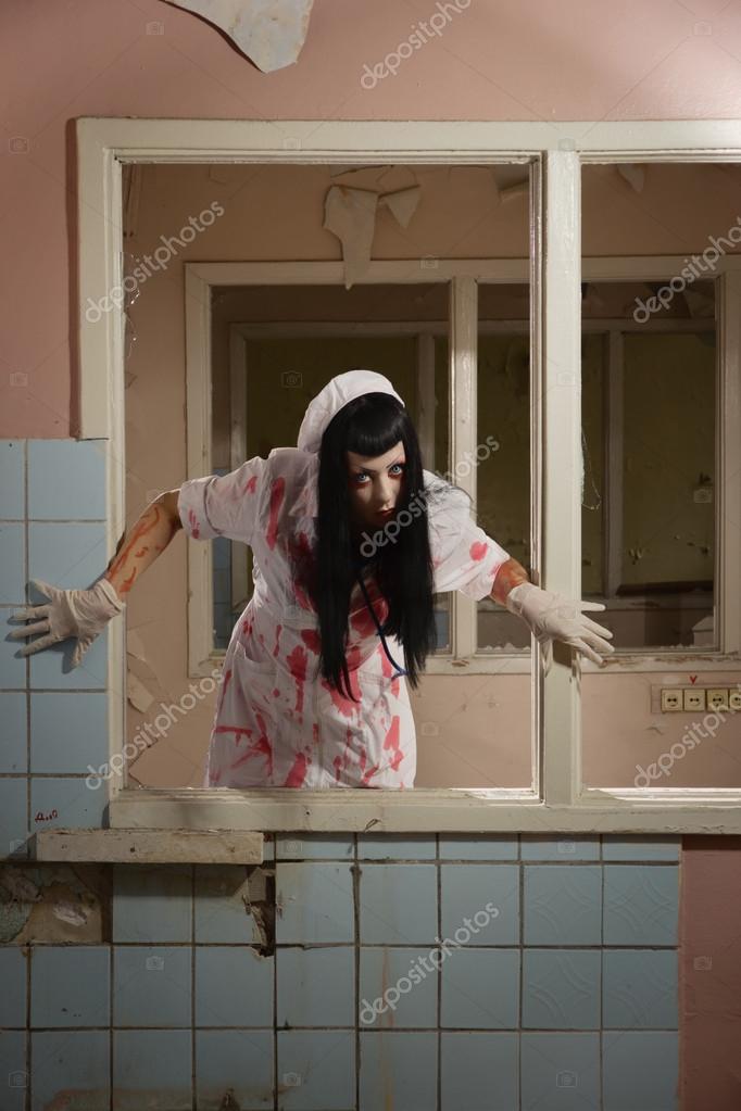 Horror movie. Crazy dead nurse Stock Photo by ©Demian 32598637