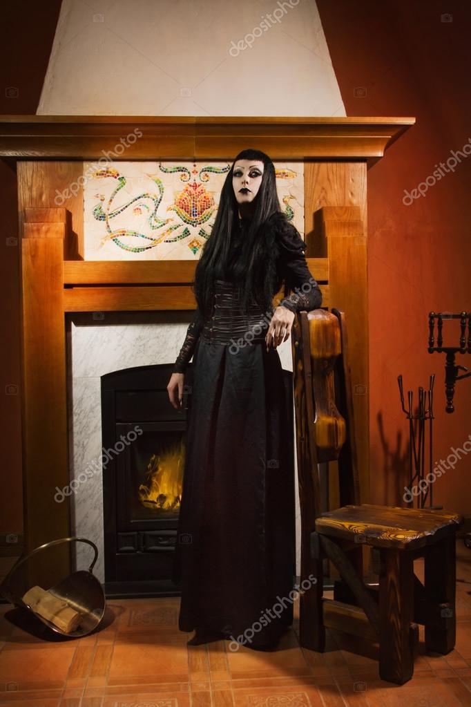 Gothic woman in a castle — Stock Photo © Demian #35332363