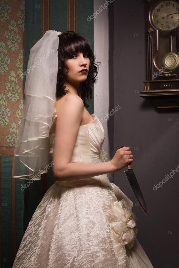 Bride with sharp knife Stock Photo by ©Demian 44623869
