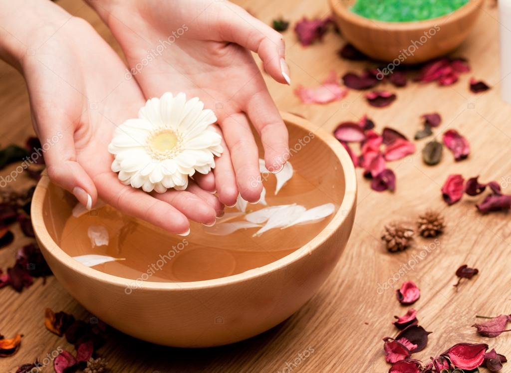 Spa.Woman's Hands with flower Stock Photo by ©logoff 16318835