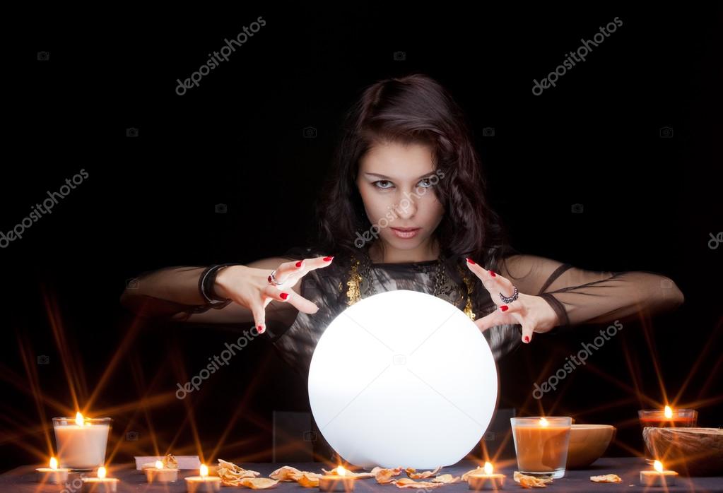Witch with magic ball Stock Photo by ©logoff 36563257