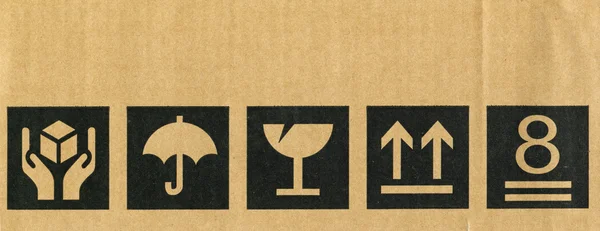 Cardboard box symbols — Stock Photo © MADDRAT #30380543