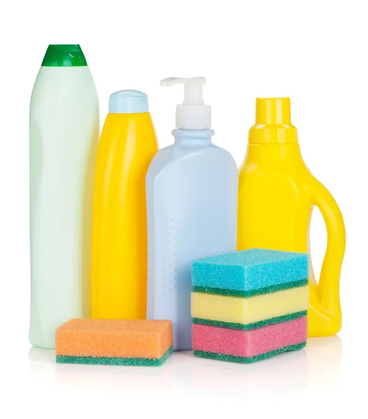 Plastic bottles of cleaning products and sponges isolated on whi Stock ...