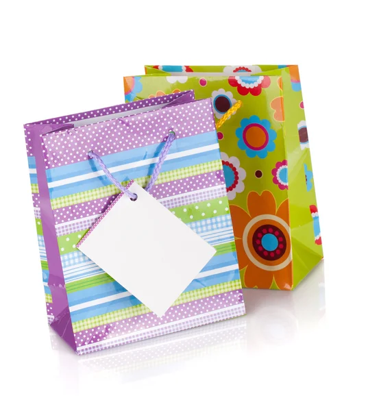 Four colored gift bags Stock Photo by ©karandaev 12720605